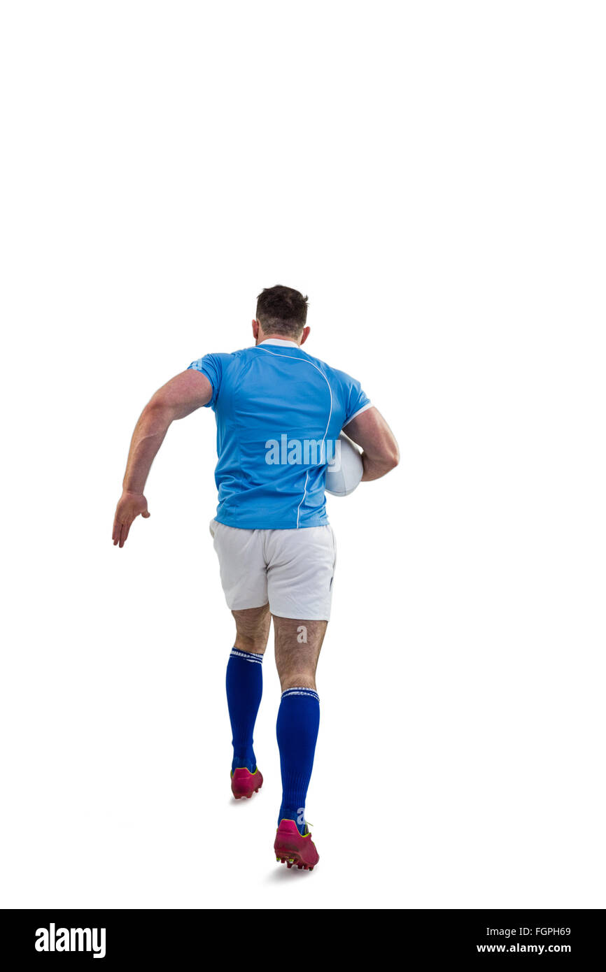 Rugby player running with the ball Stock Photo - Alamy