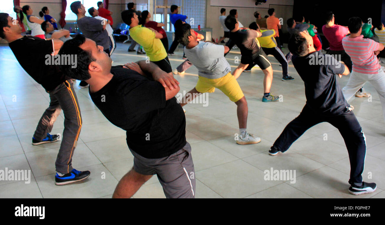 Group of people exercising Yoga in a class, Karnataka, India Stock ...