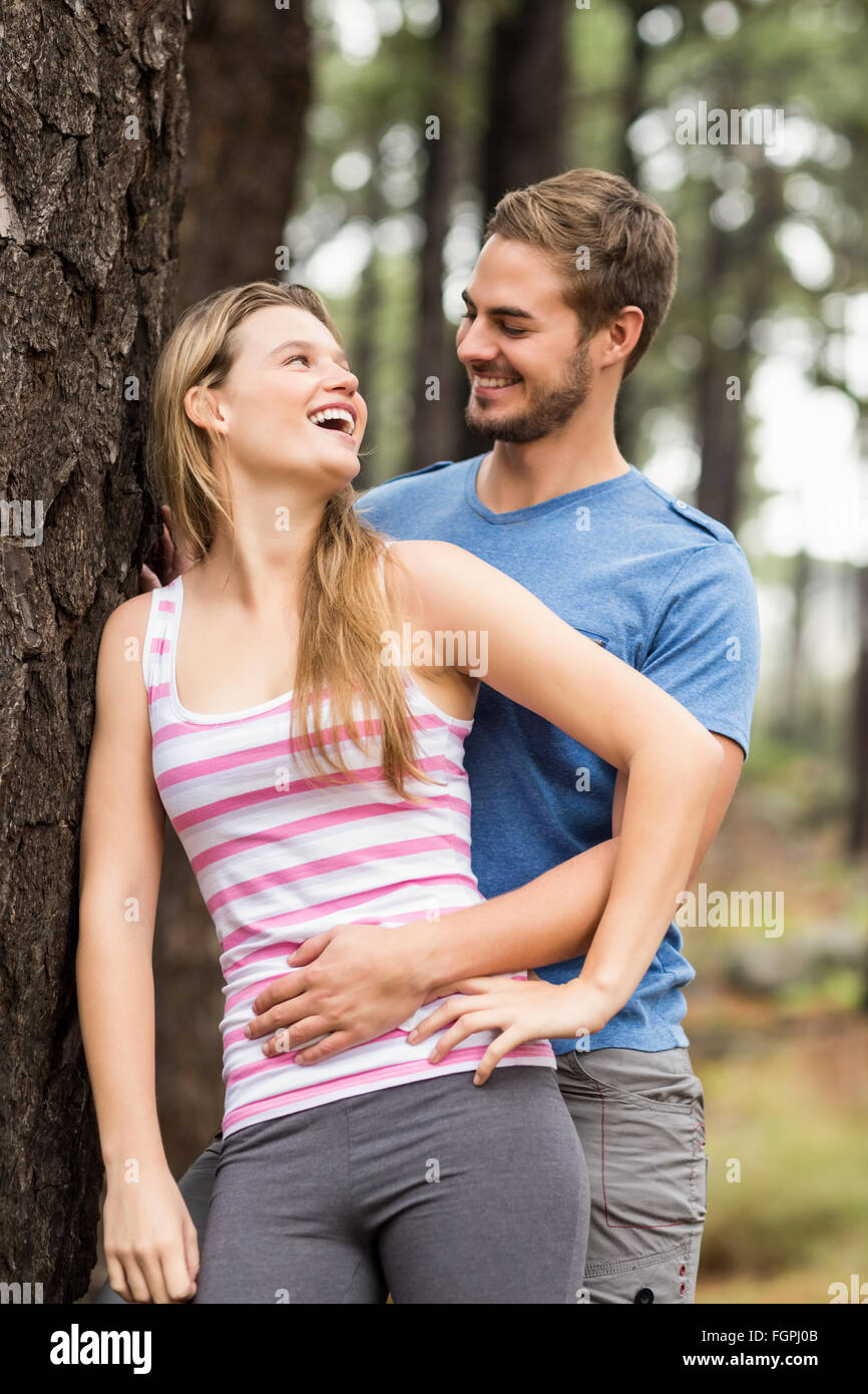 Young happy hiker couple laughing Stock Photo - Alamy