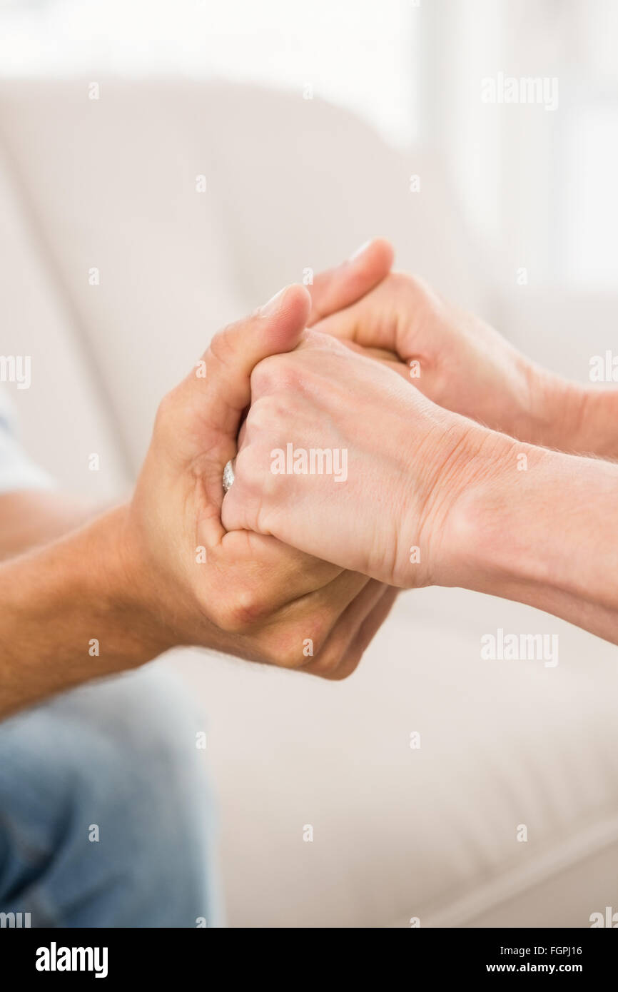 Close up view of therapist comforting male patient Stock Photo - Alamy