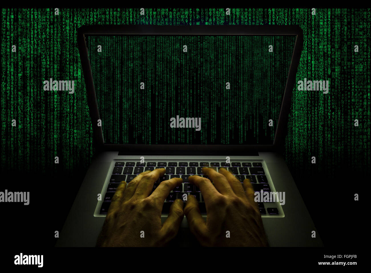 Moving hands at a laptop typing code Stock Photo - Alamy