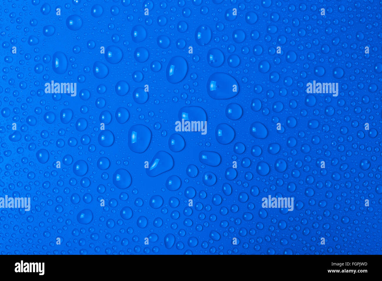 Blue water drops background Stock Photo - Alamy