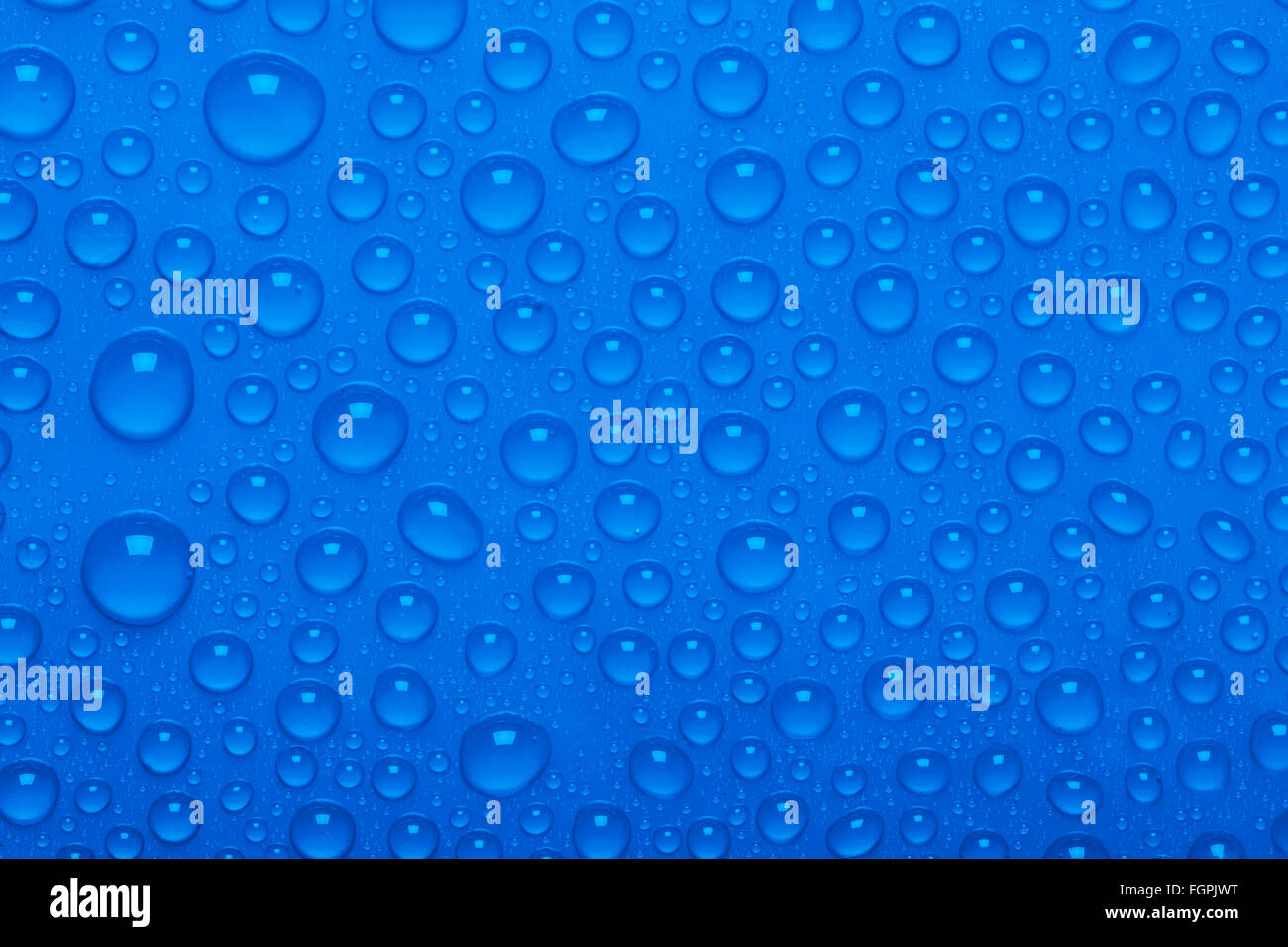 Blue water drops background Stock Photo - Alamy