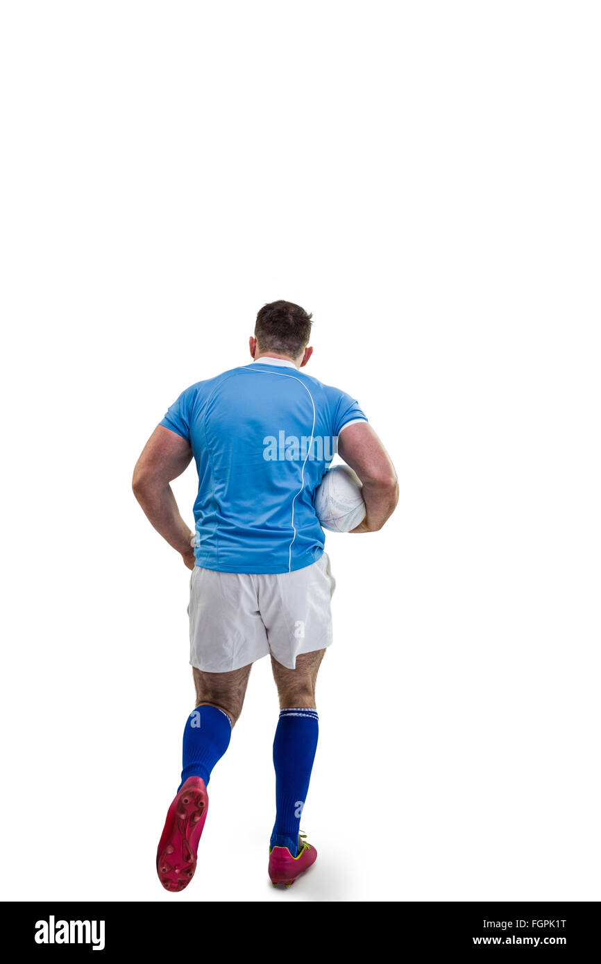 Rugby player running with the ball Stock Photo - Alamy