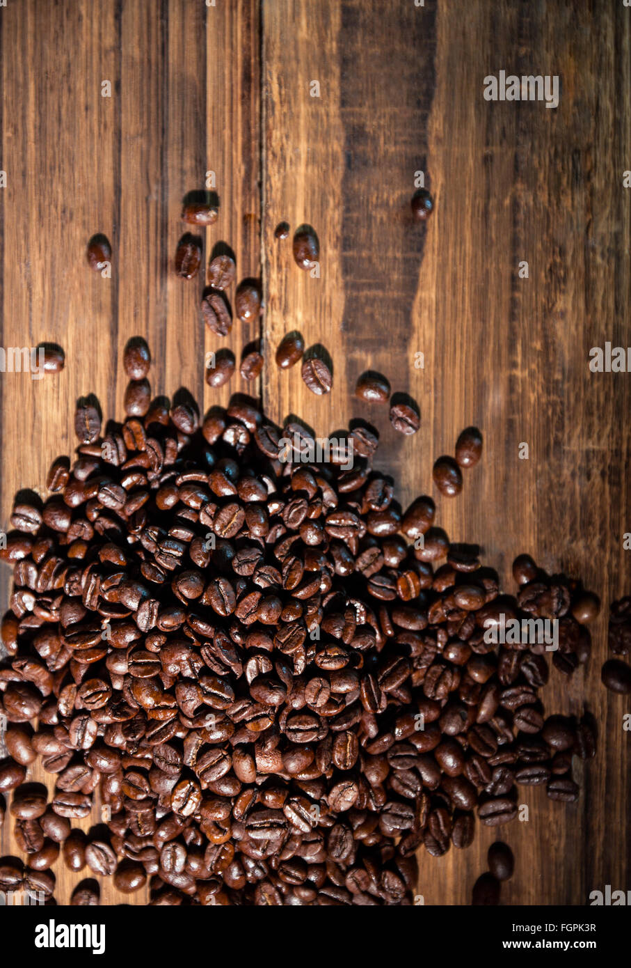 Coffee beans on a table Stock Photo - Alamy