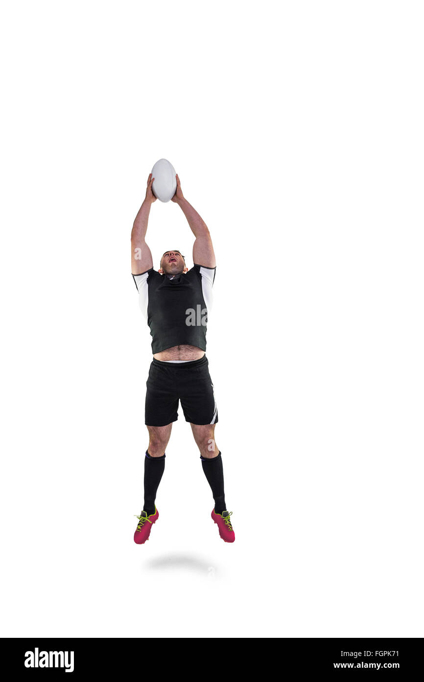 Rugby player catching the ball Stock Photo - Alamy