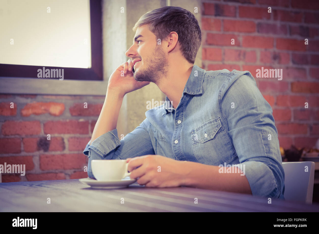Smiling man cafe looking out window hi-res stock photography and images ...