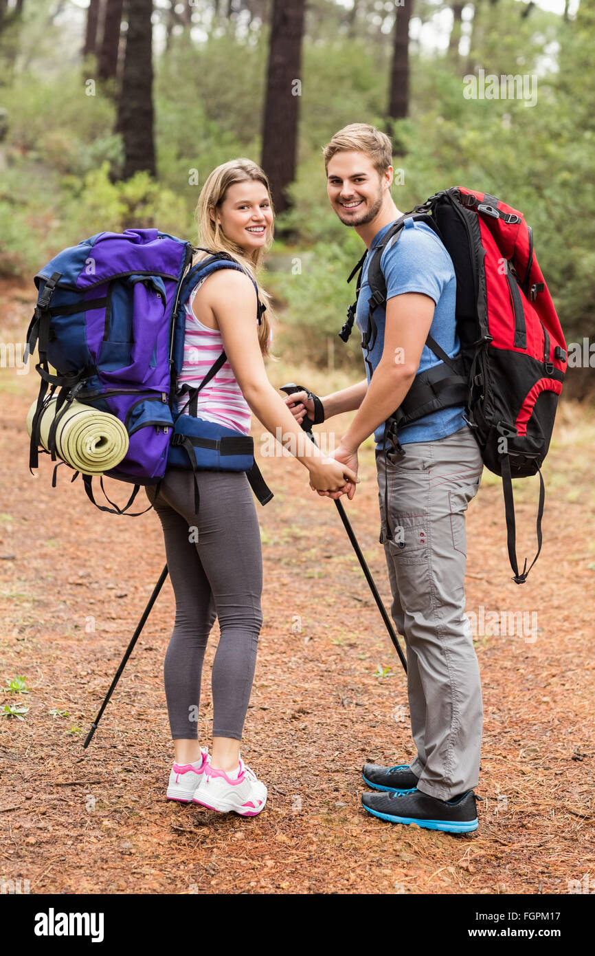 Portrait of a young happy hiker couple Stock Photo - Alamy