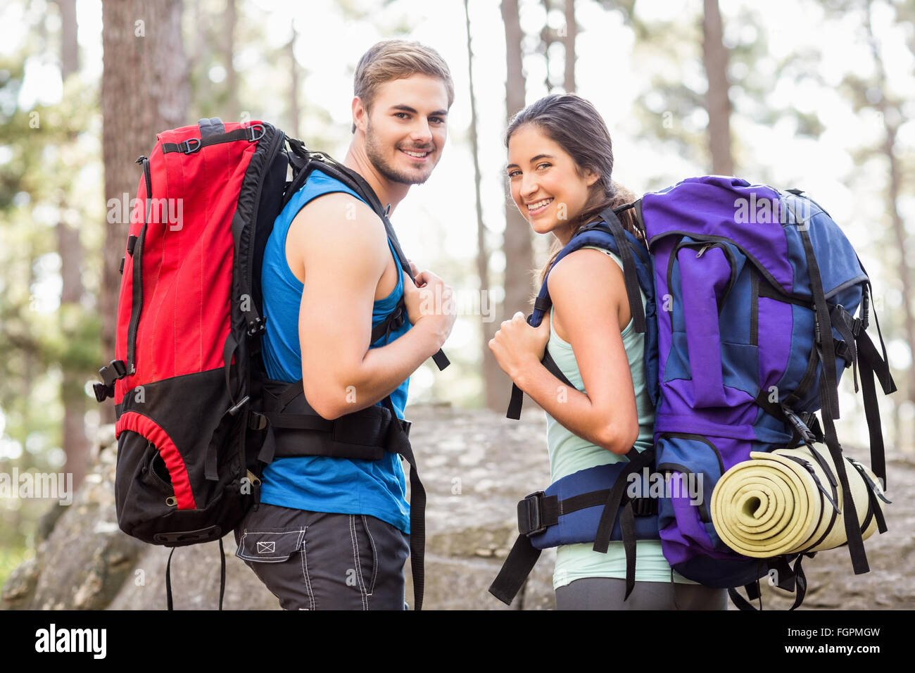 Young happy joggers looking at camera Stock Photo - Alamy
