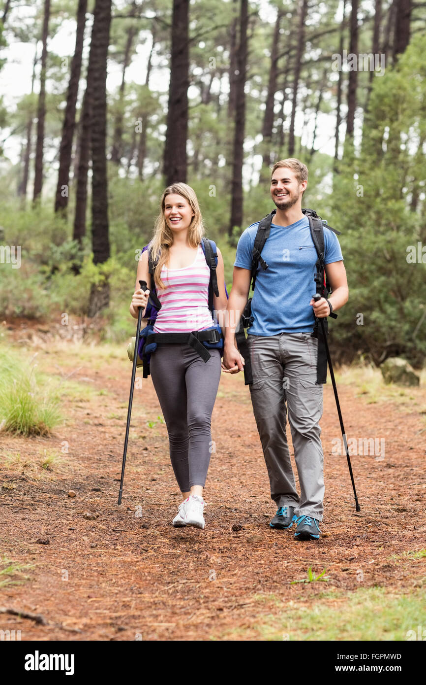 Young happy hiker couple hiking Stock Photo - Alamy