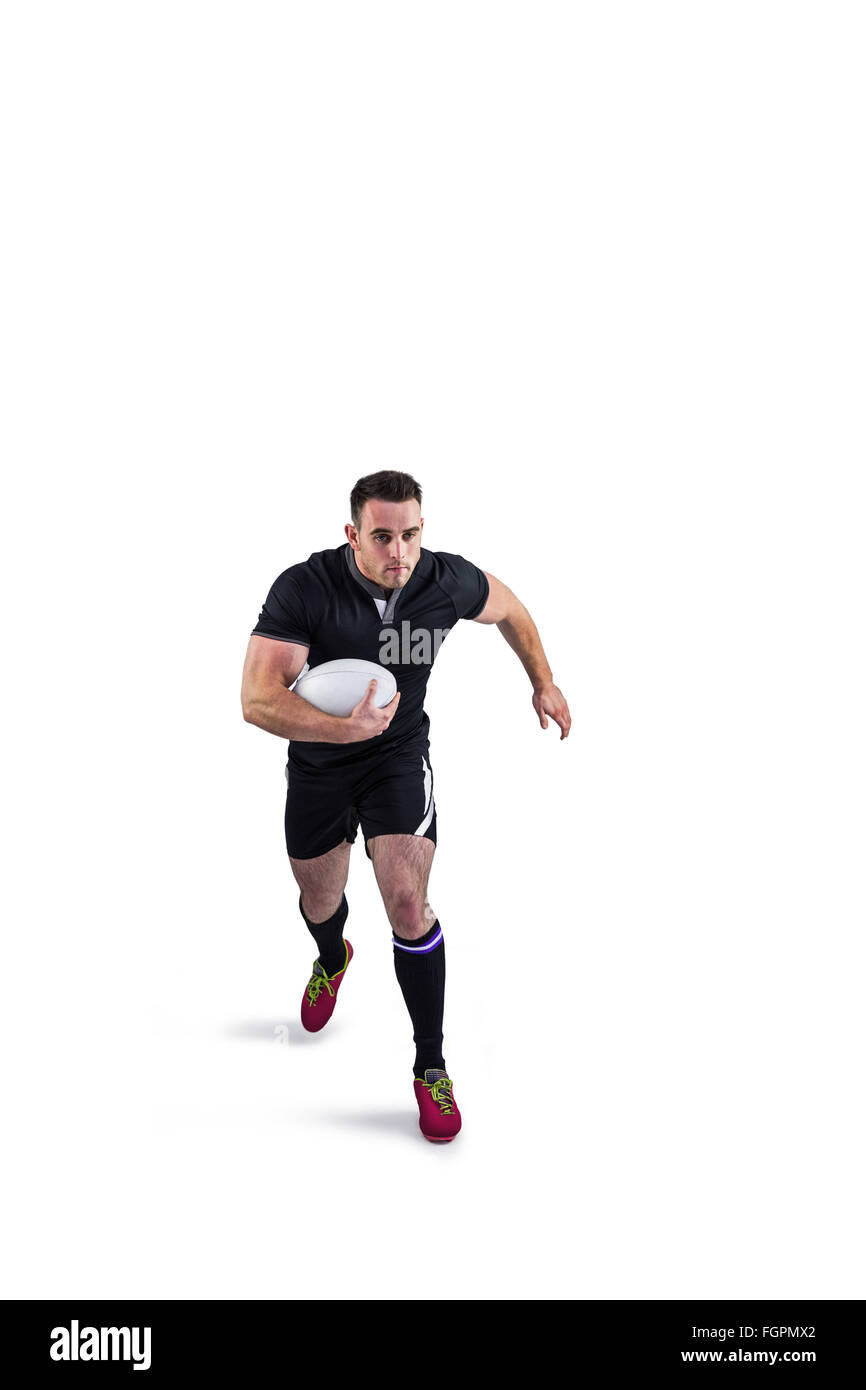 Rugby player running with the ball Stock Photo - Alamy