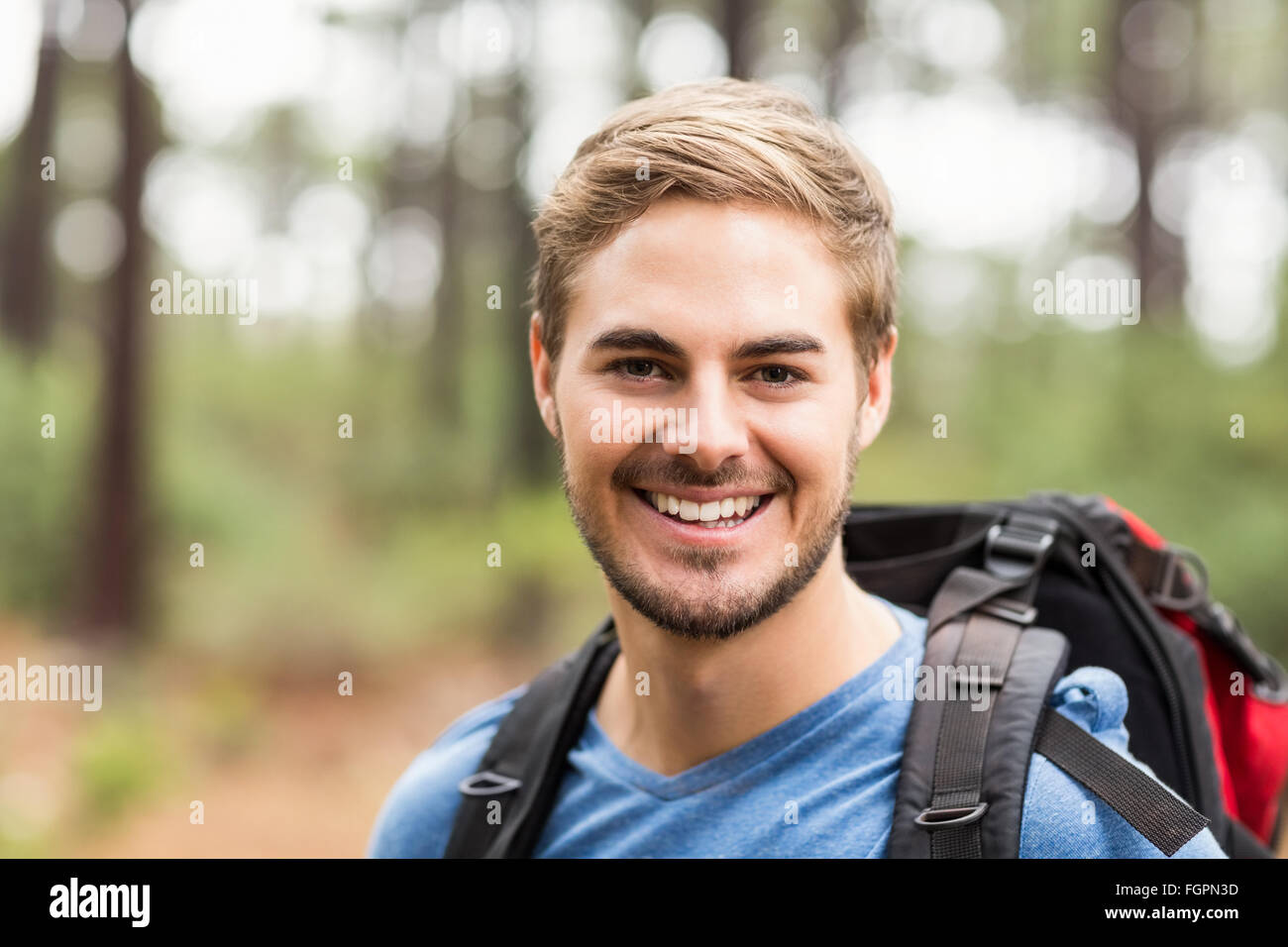 Portrait of a young handsome hiker Stock Photo - Alamy