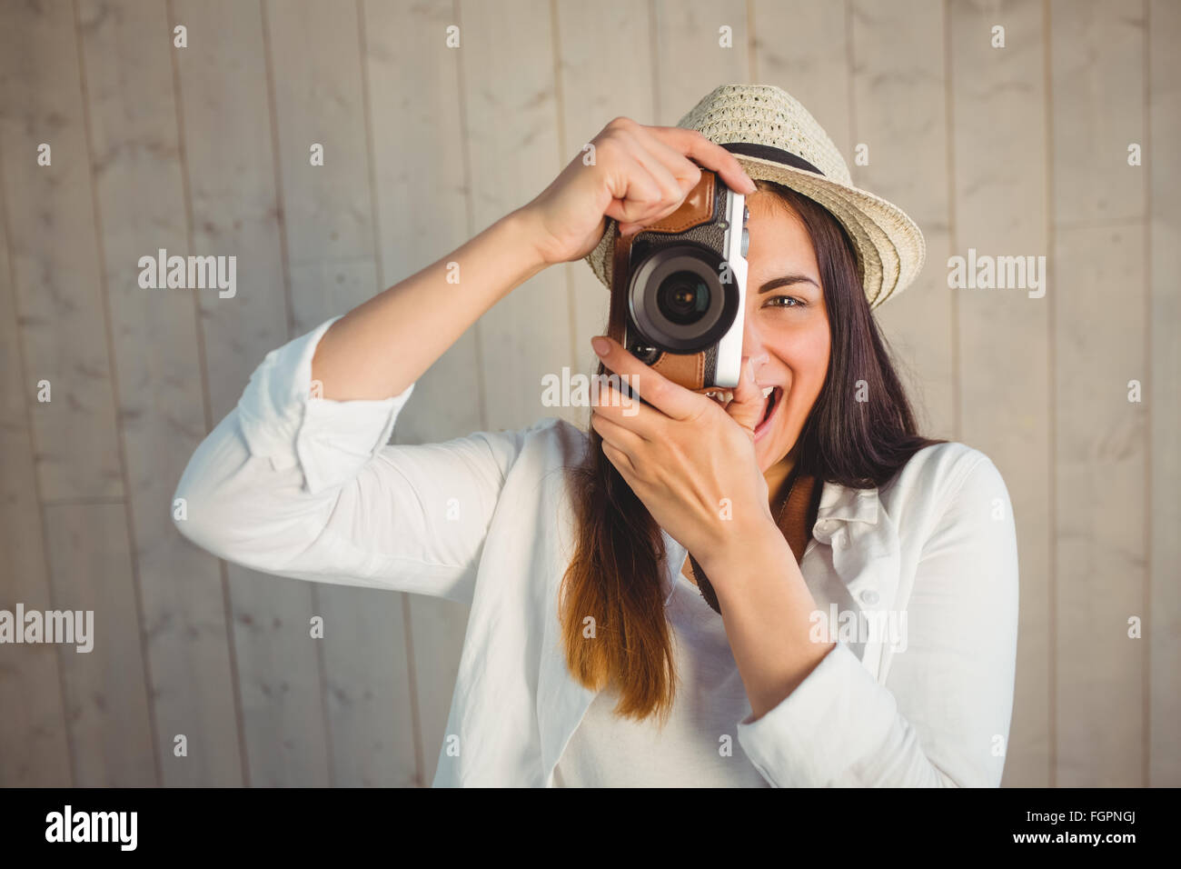 Pretty hipster using her vintage camera Stock Photo - Alamy