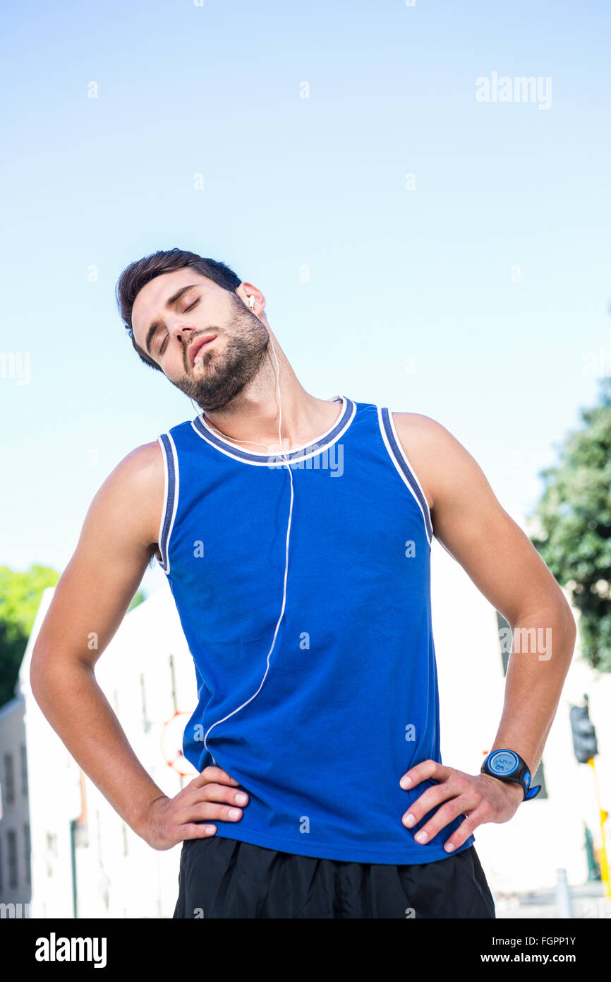 Handsome athletic stretching his neck Stock Photo - Alamy