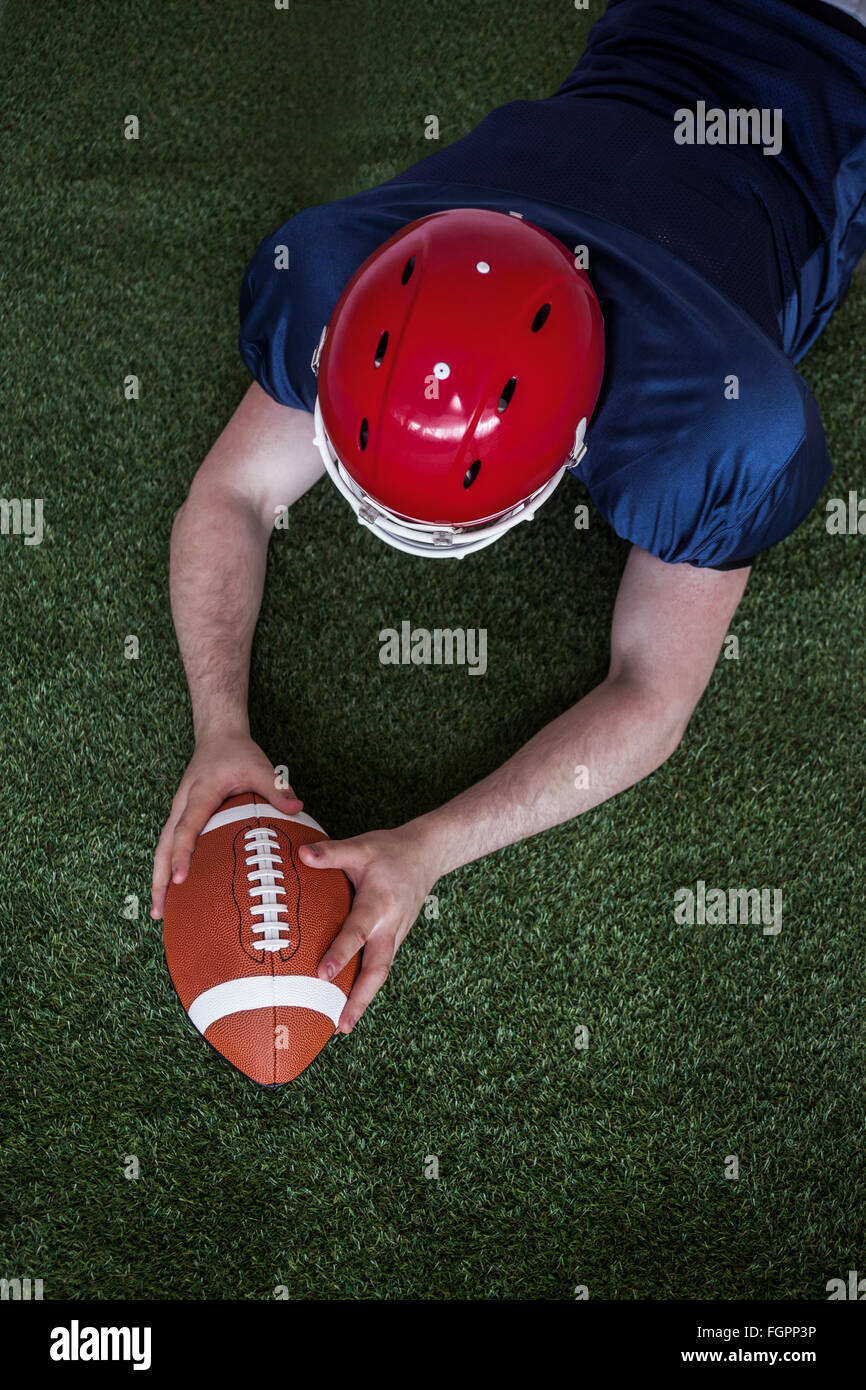 American football player scoring a touchdown Stock Photo - Alamy