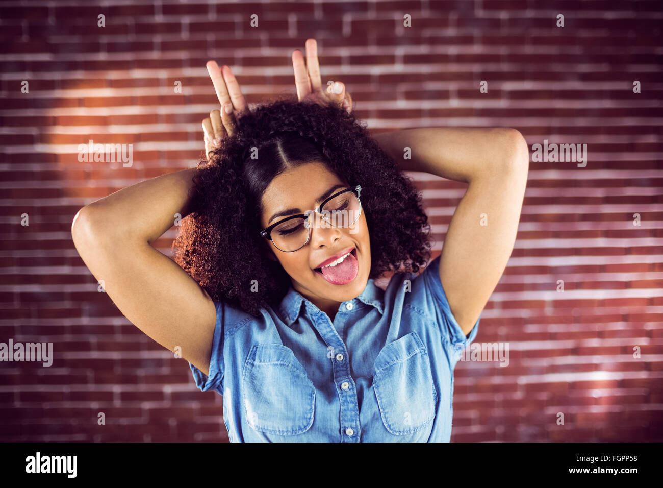 Attractive hipster having fun Stock Photo - Alamy