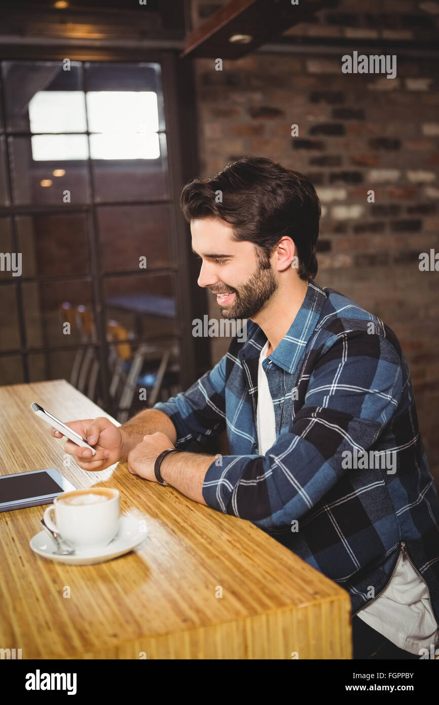 Young student using his smartphone Stock Photo - Alamy
