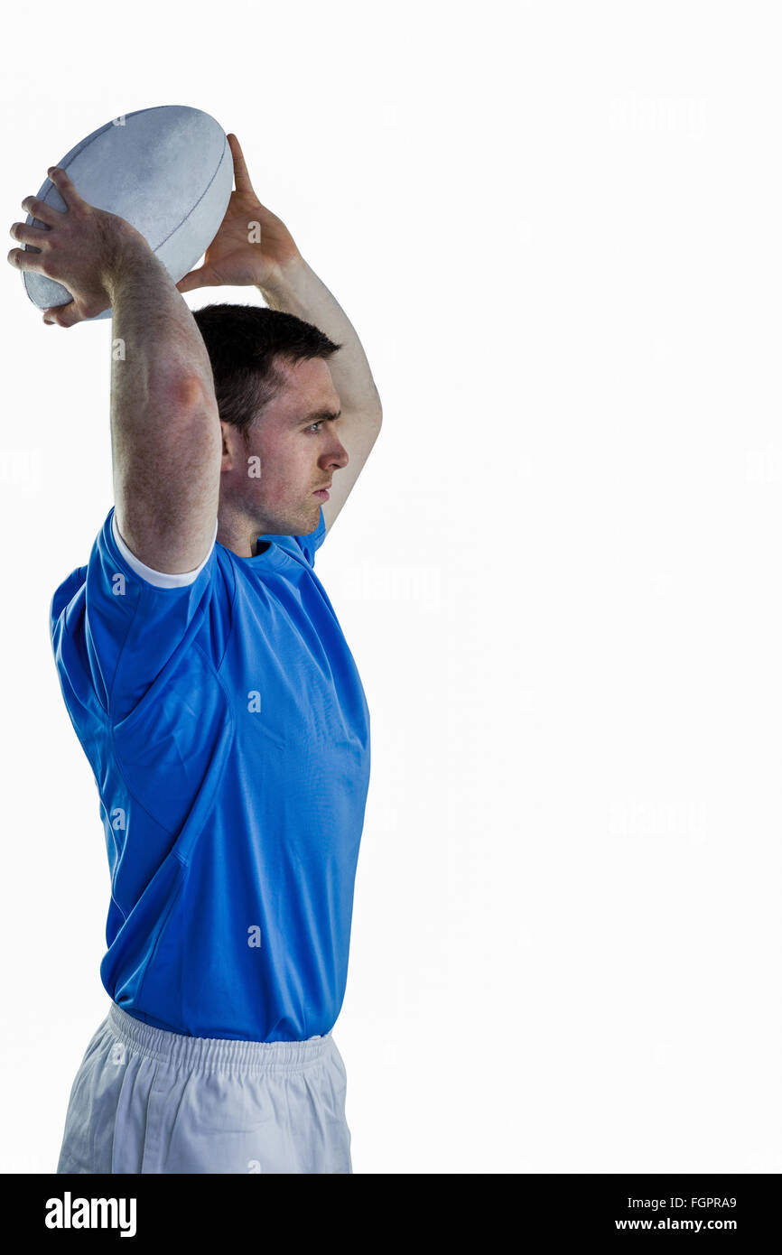 Rugby player about to throw a rugby ball Stock Photo - Alamy