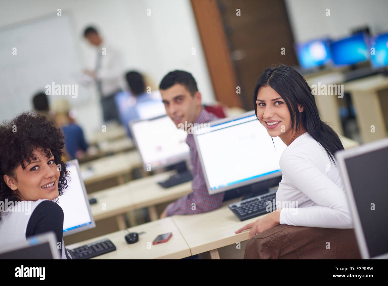 students group in computer lab classroom Stock Photo - Alamy