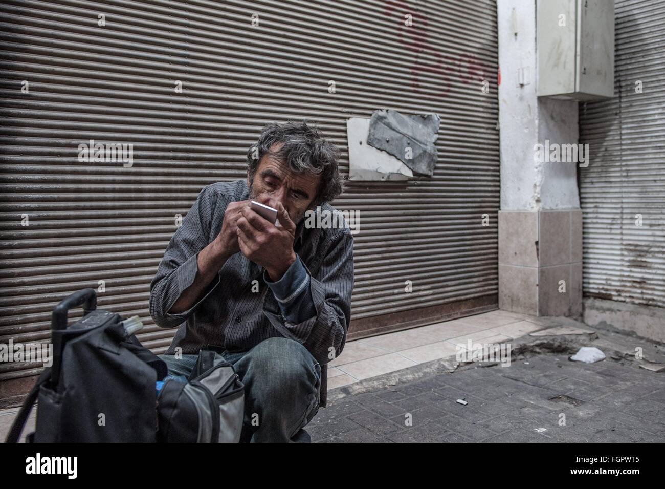 Drug Addict Taking Drugs In A Dark Alley Stock Photo - Alamy