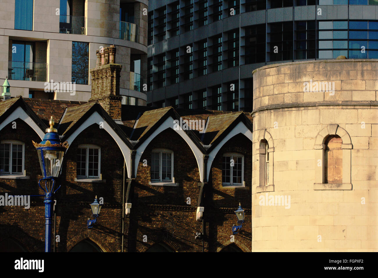 Parts of new and old buildings near Tower Bridge, in London, England ...