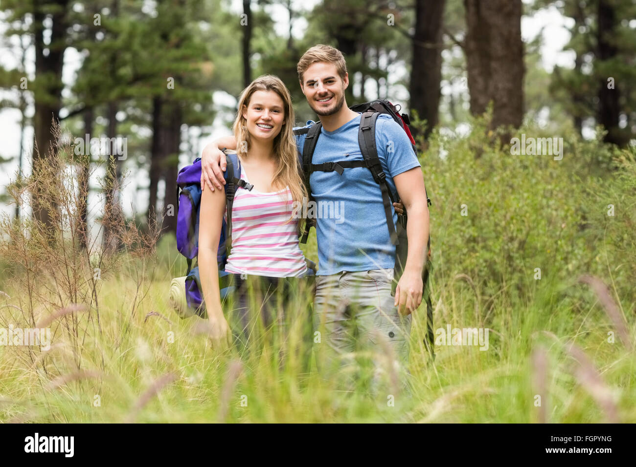 Portrait of a happy hiker couple Stock Photo - Alamy