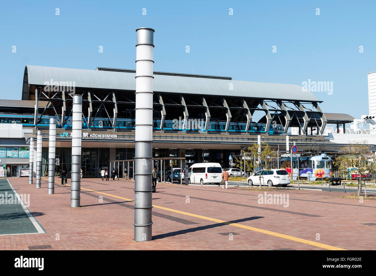JR modern Kochi city station in Japan. Foreground, taxi rank, car ...