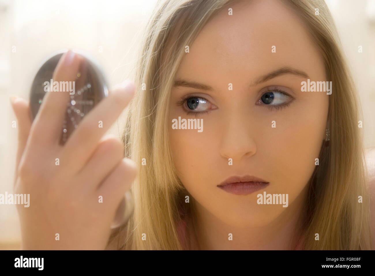 Eyed woman mirror hi-res stock photography and images - Alamy