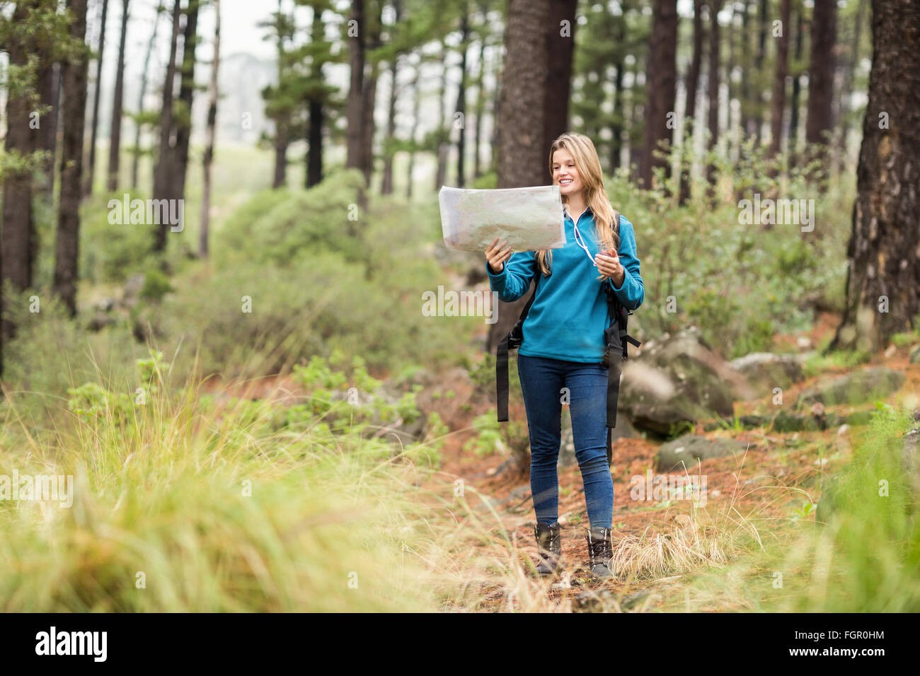 Female hiker map compass hi-res stock photography and images - Alamy
