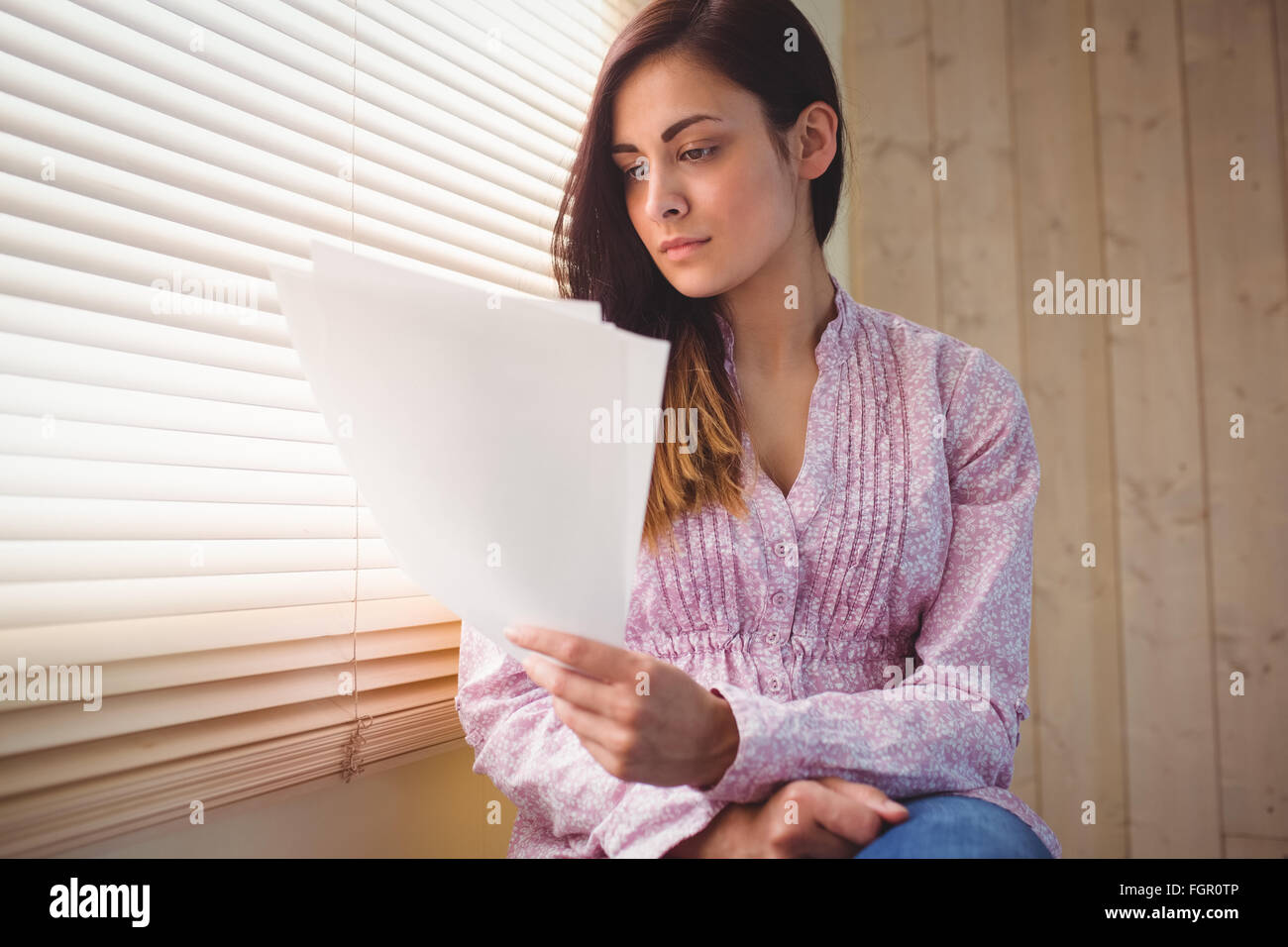 Hipster reading documents hi-res stock photography and images - Alamy