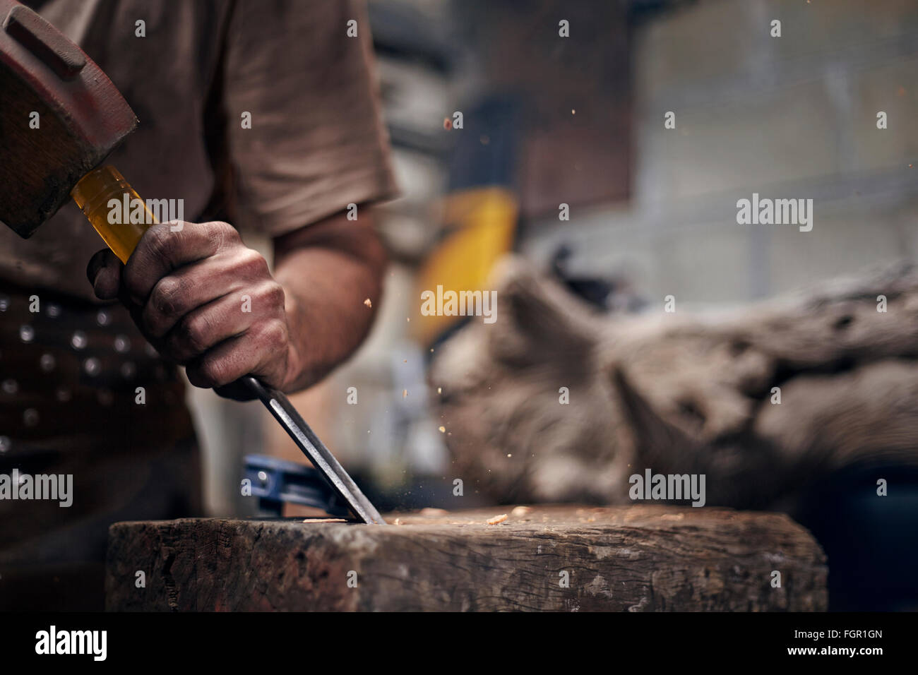Blacksmith workshop man holding metal hi-res stock photography and ...