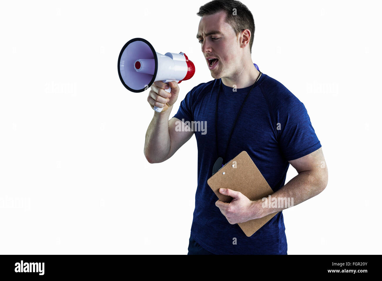 Male trainer yelling through the megaphone Stock Photo - Alamy