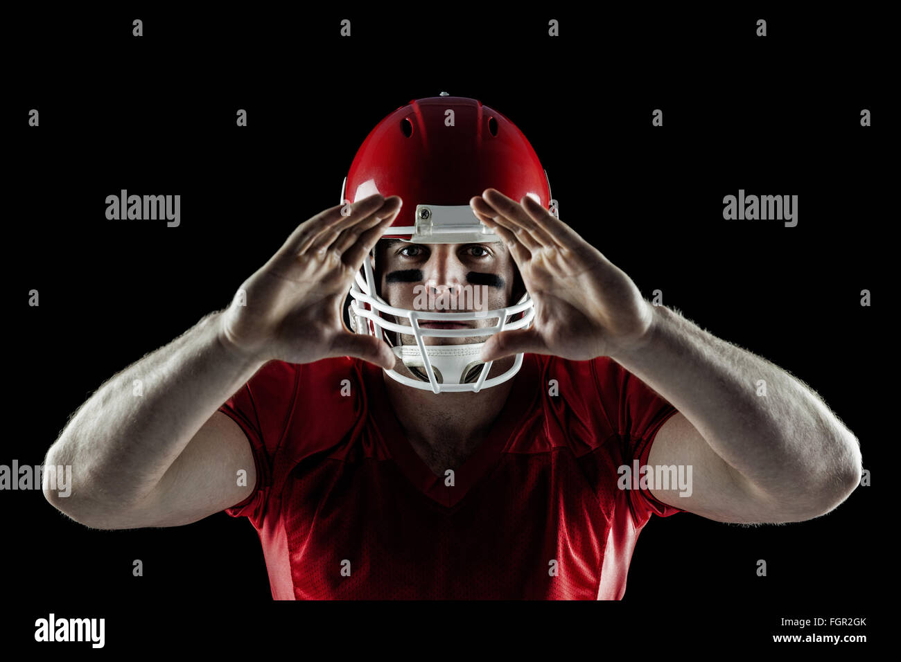 American football player making hand gesture Stock Photo - Alamy