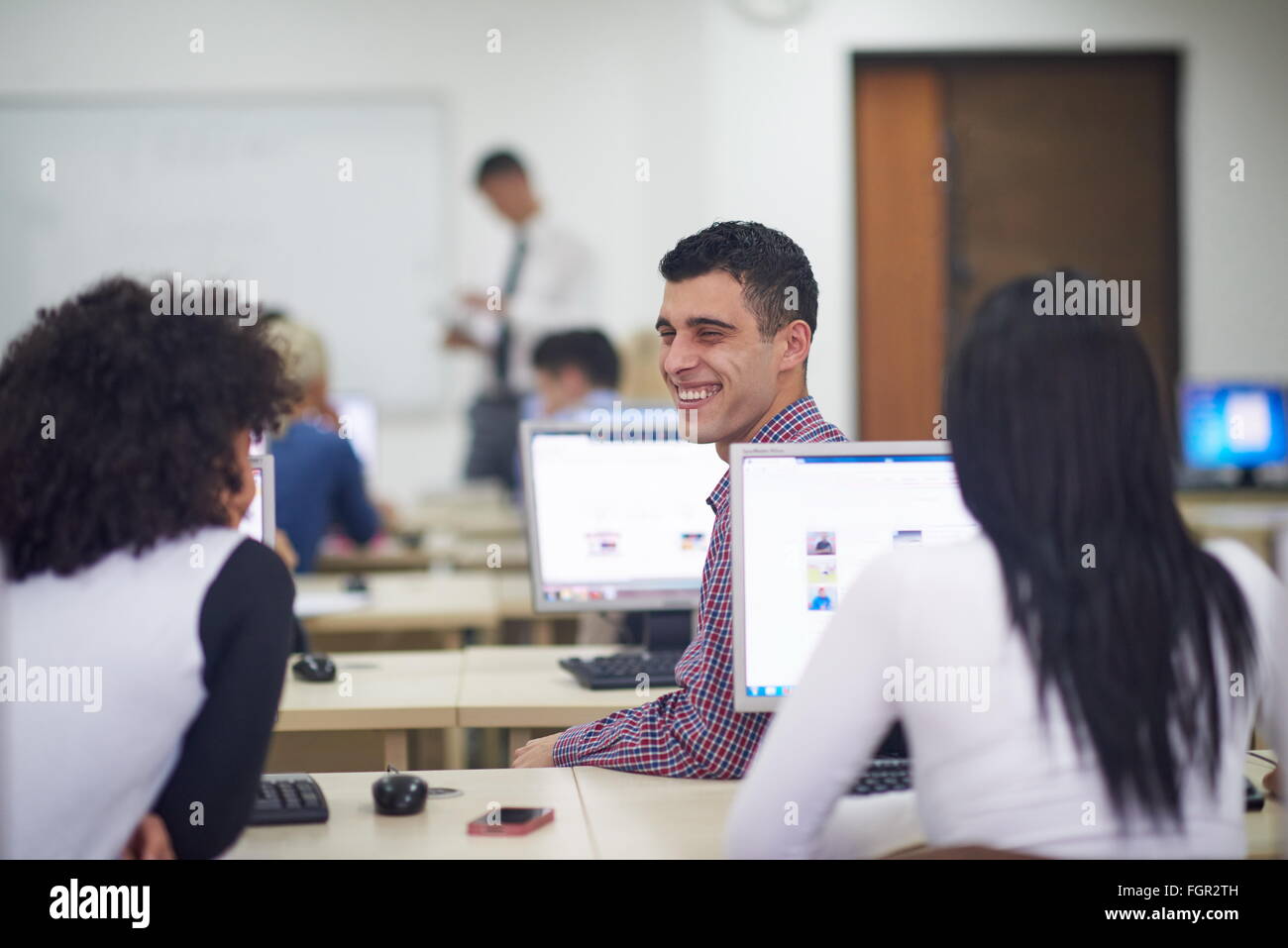 students group in computer lab classroom Stock Photo - Alamy