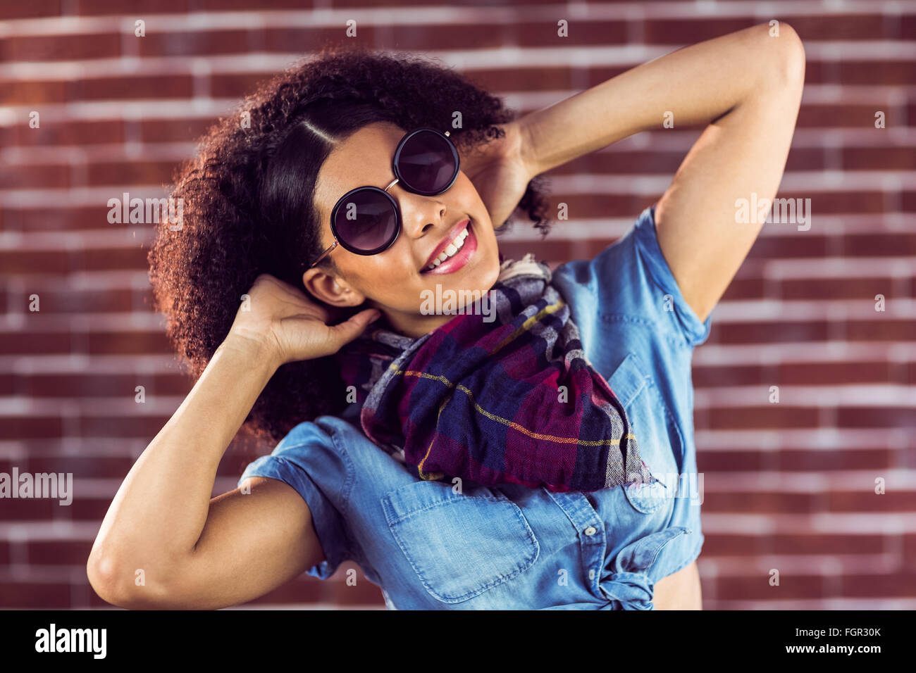 Attractive young woman feeling good Stock Photo - Alamy