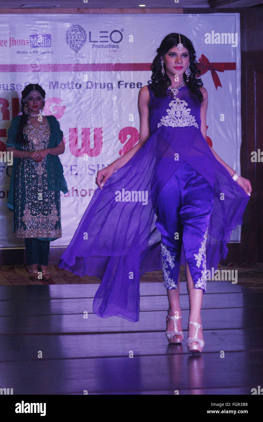 Lahore, Pakistan. 21st Feb, 2016. Pakistani model walks on ramp ...