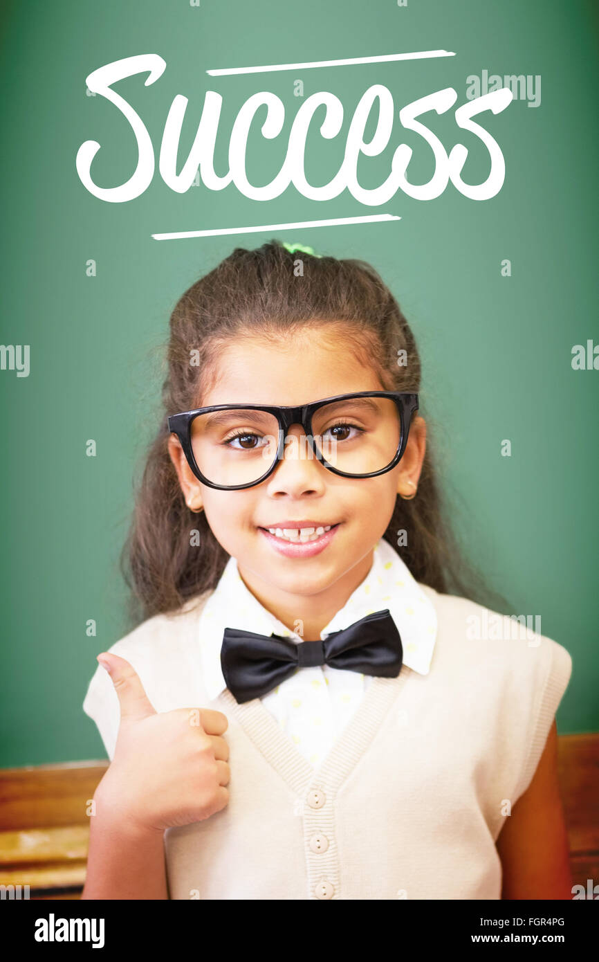 Success against cute pupil dressed up as teacher in classroom Stock ...