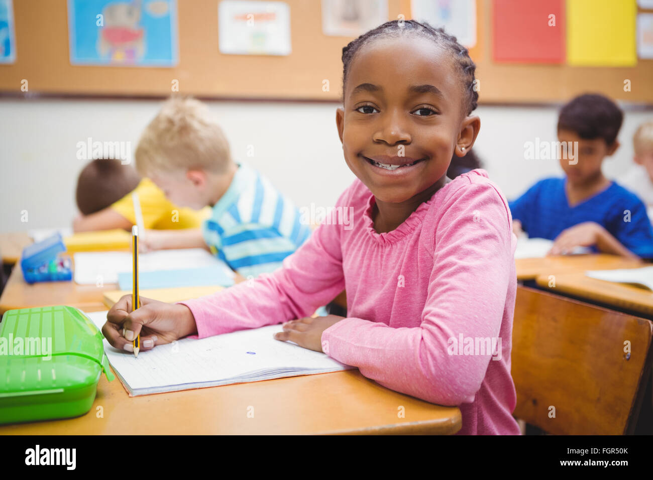 Busy students working on class work Stock Photo - Alamy