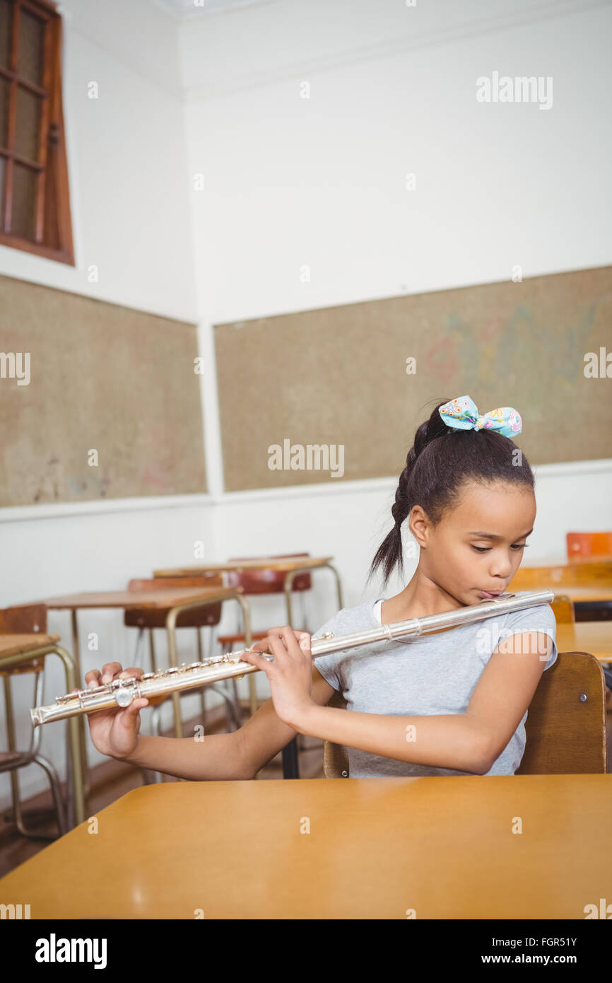 Student using a flute in class Stock Photo - Alamy
