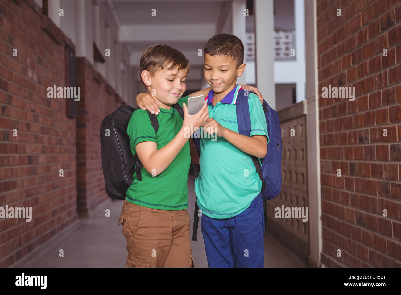 Students using a mobile phone Stock Photo - Alamy