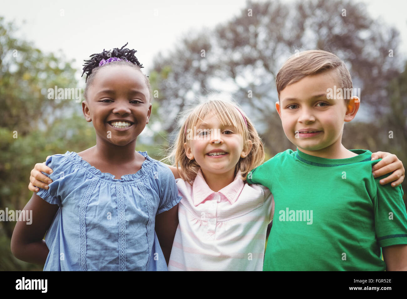 Smiling happy students looking at the camera Stock Photo - Alamy