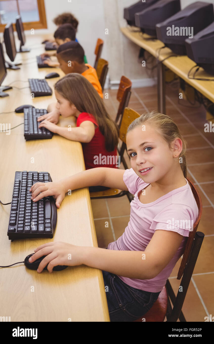 Smiling student using a computer Stock Photo - Alamy