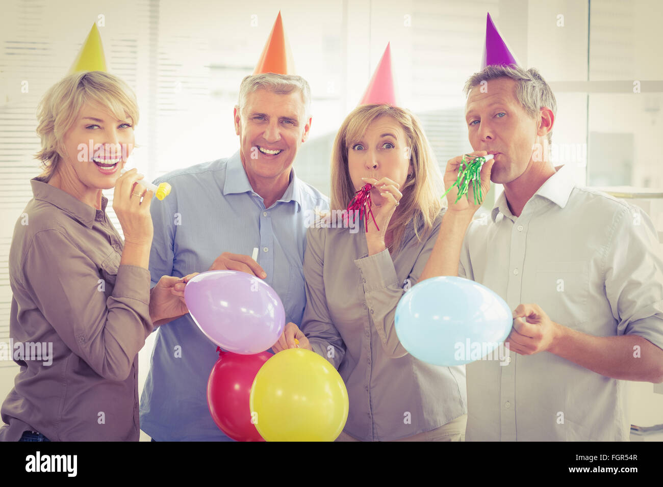 Casual business people celebrating birthday Stock Photo - Alamy