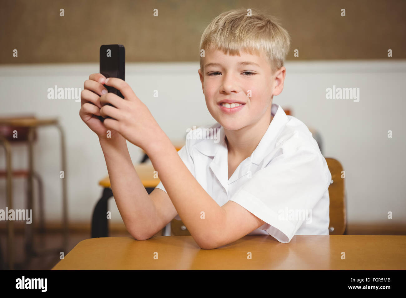 Pupil mobile phone class hi-res stock photography and images - Alamy