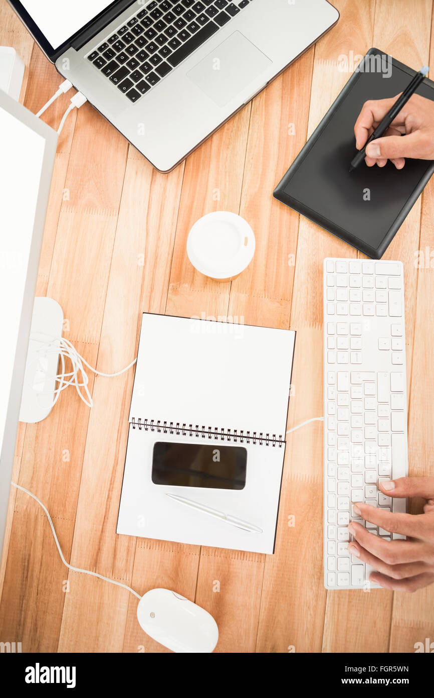 Hands working with computer and digitizer Stock Photo - Alamy