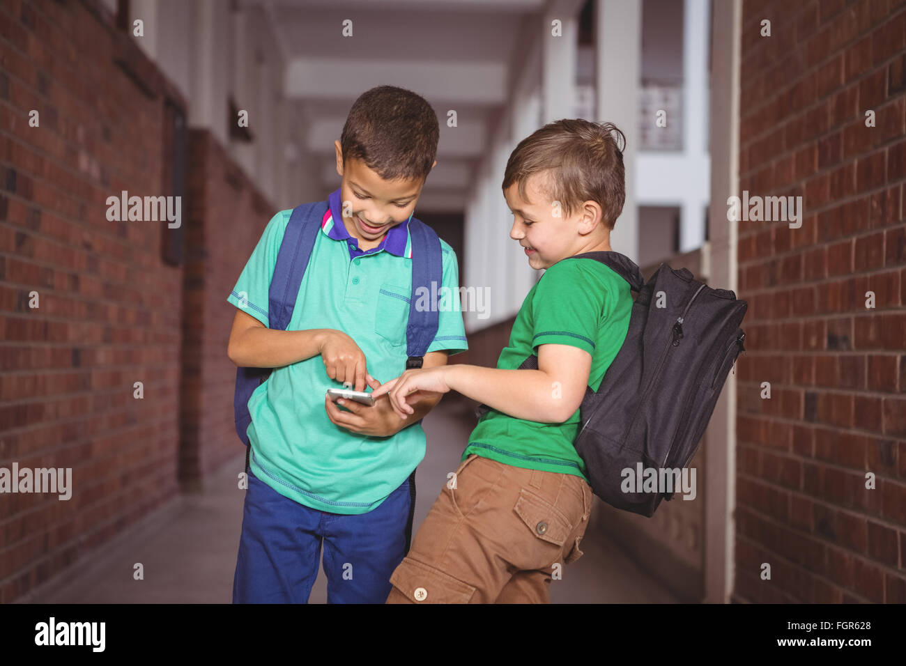Students using a mobile phone Stock Photo - Alamy