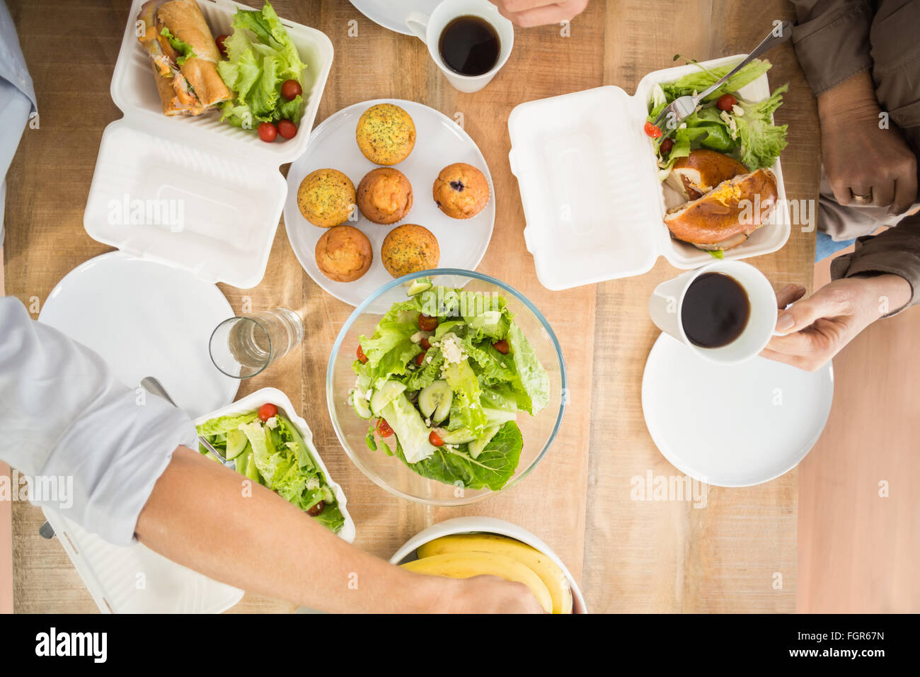 Business people having lunch together Stock Photo - Alamy