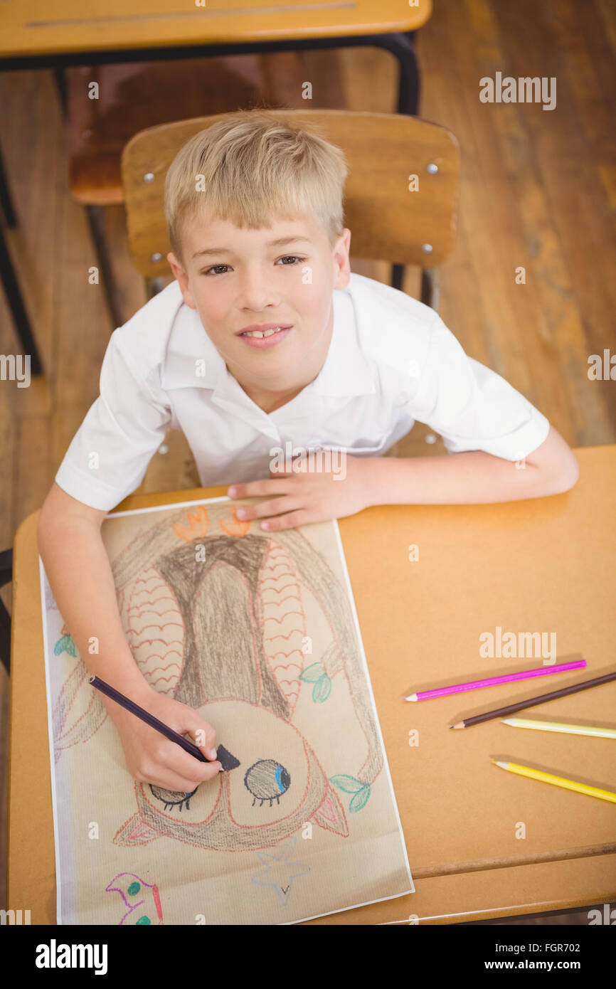 Student drawing on a sheet of paper Stock Photo - Alamy