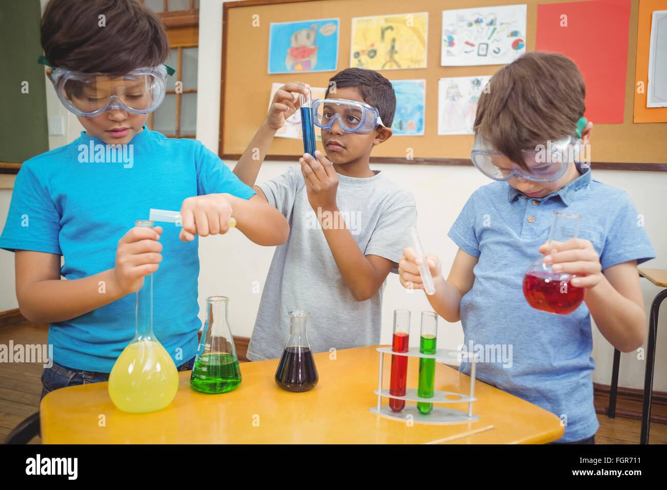 Pupils at science lesson in classroom Stock Photo - Alamy