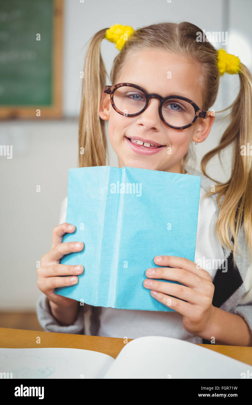 Pupil standing reading book in class hi-res stock photography and ...